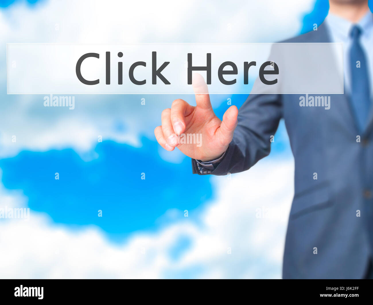 Click Here - Businessman hand pressing button on touch screen interface ...