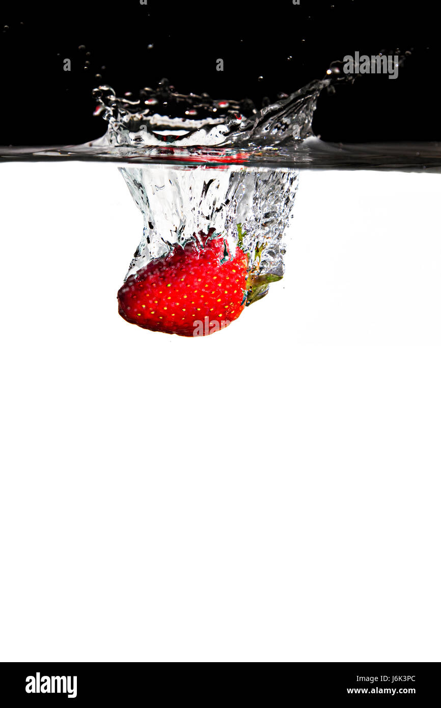 strawberry in water Stock Photo - Alamy