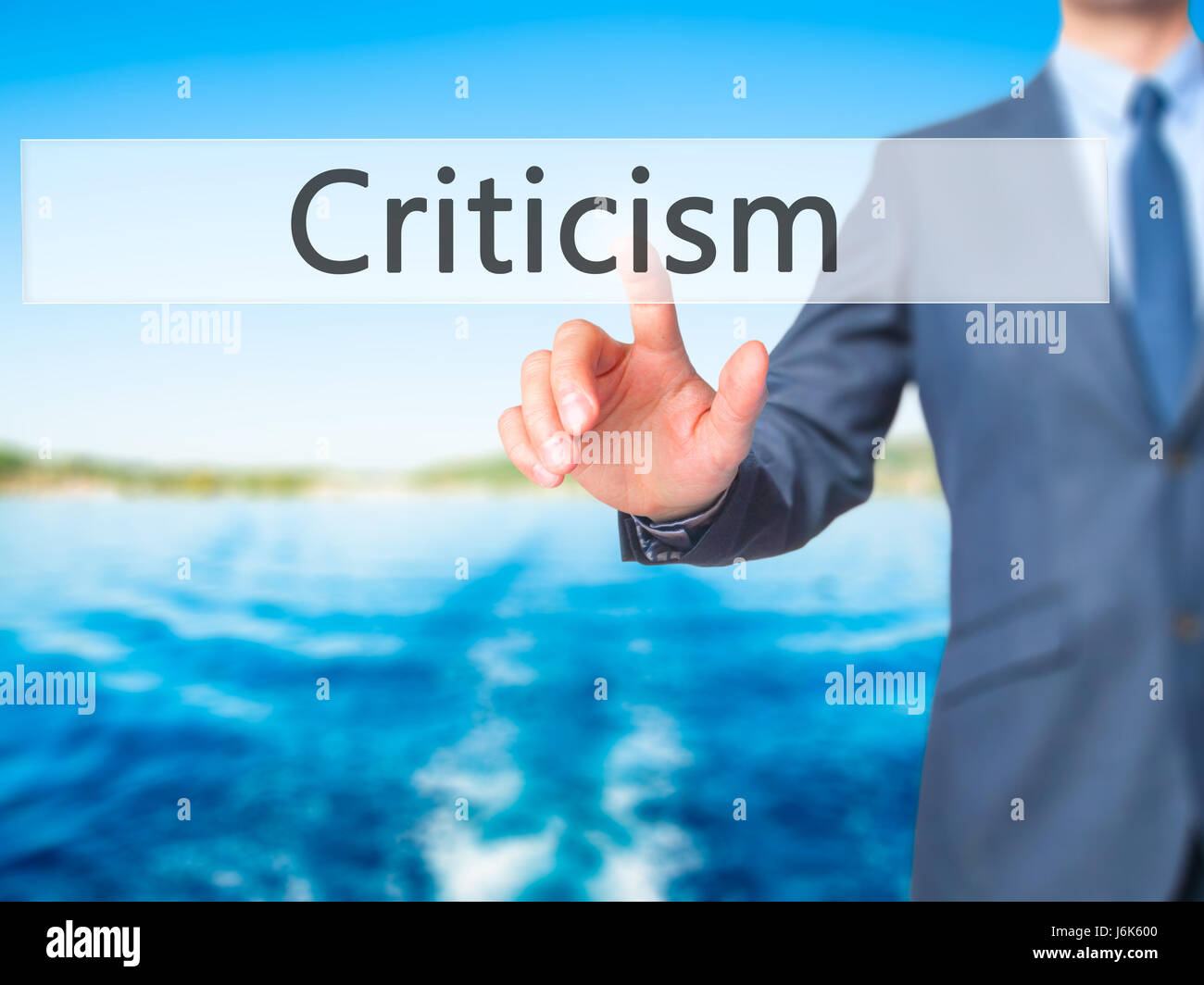 Criticism - Businessman hand touch button on virtual screen interface ...