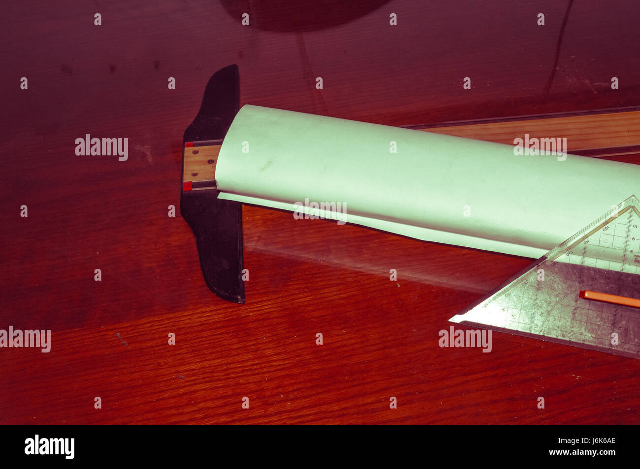 engineering concept background, ruler with drawings and triangle on ...