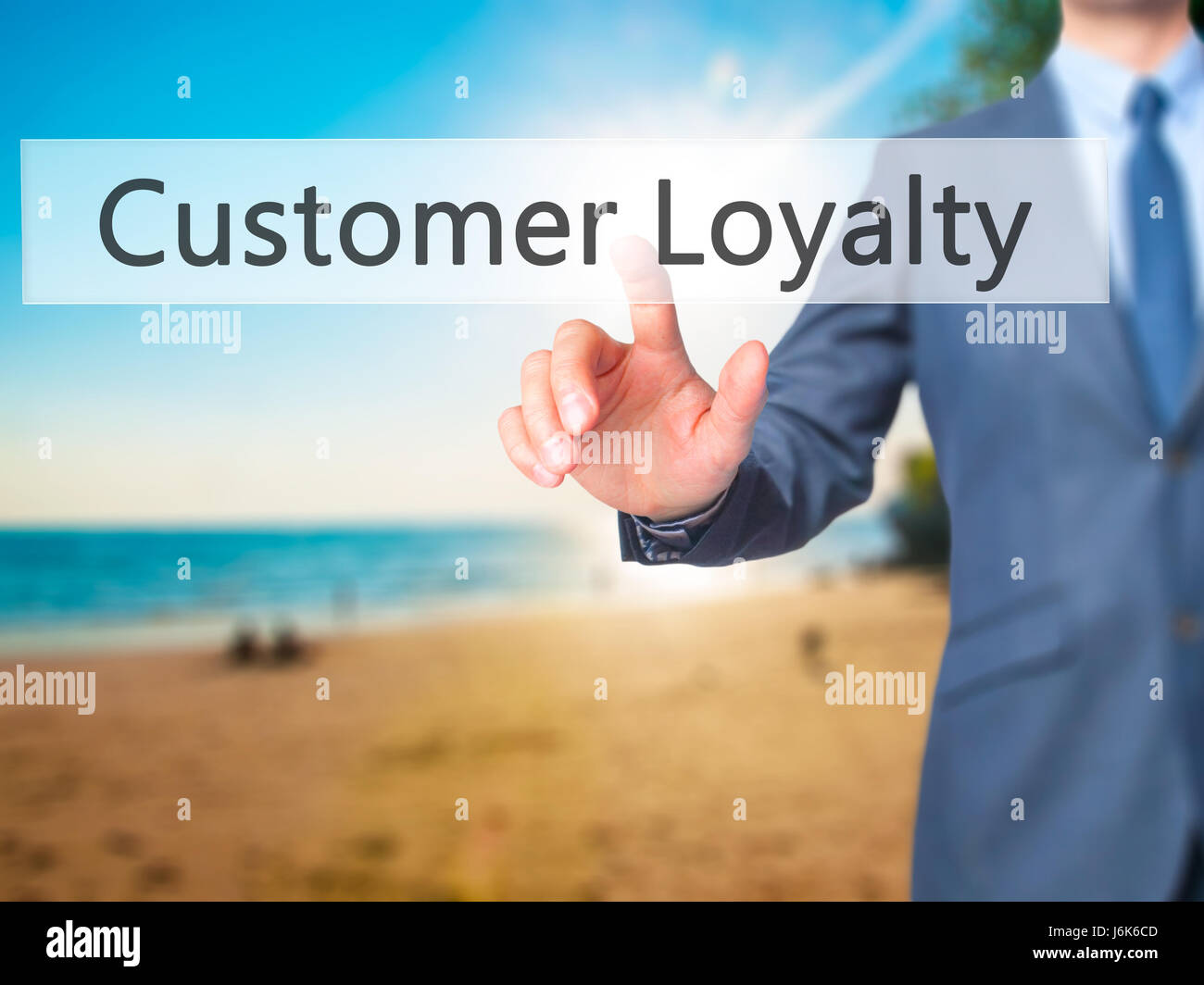Customer Loyalty - Businessman hand pushing button on touch screen ...
