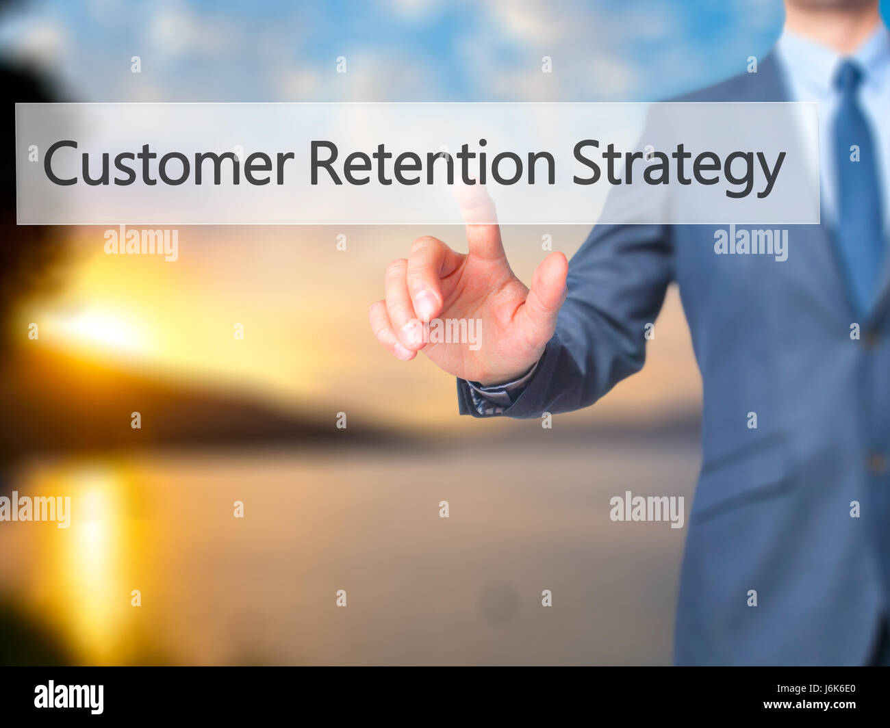 Customer Retention Strategy - Businessman hand pushing button on touch ...