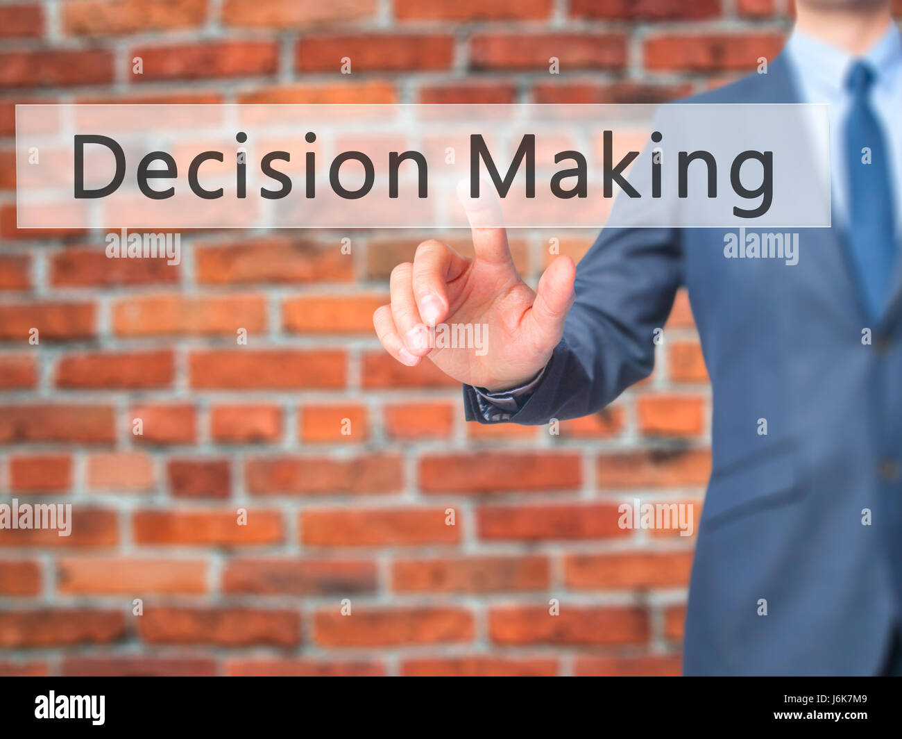 Decision Making - Businessman hand pushing button on touch screen ...