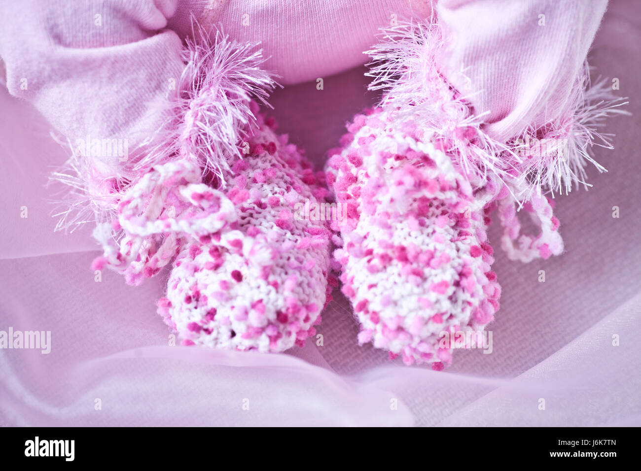 baby booties pink Stock Photo - Alamy