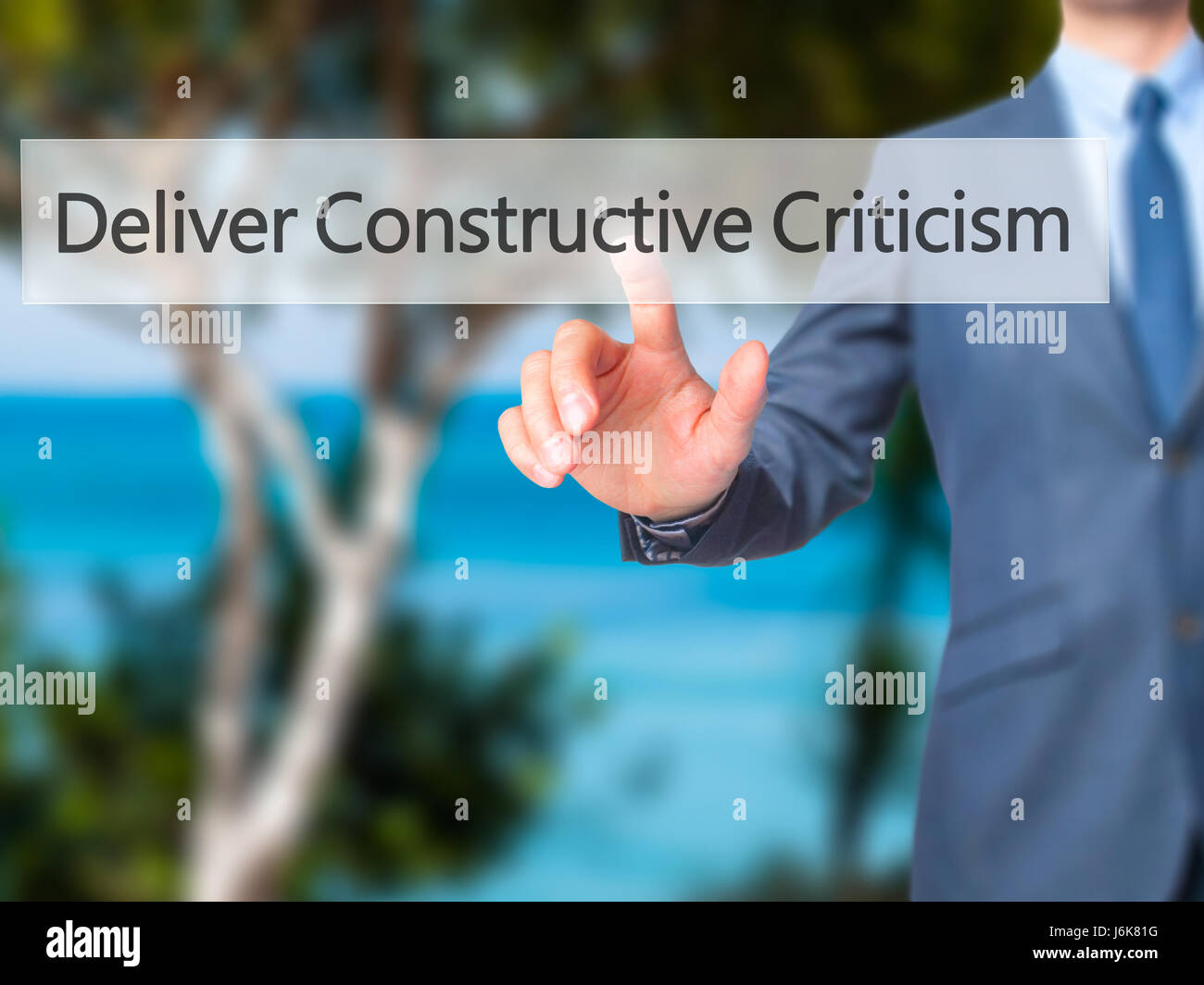 Deliver Constructive Criticism - Businessman hand pushing button on ...