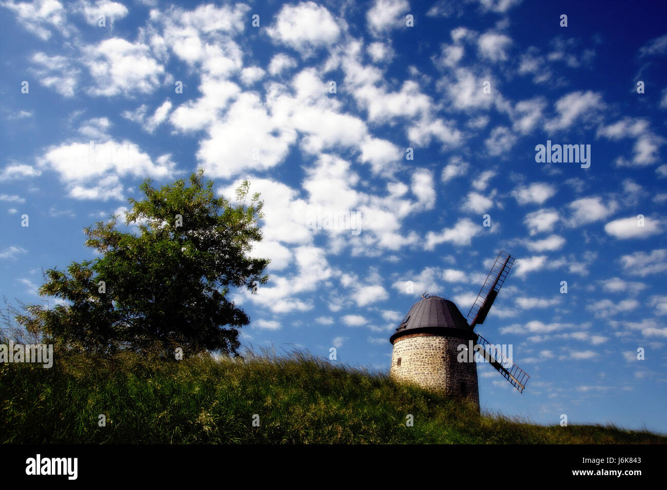 windmill with clouds Stock Photo - Alamy