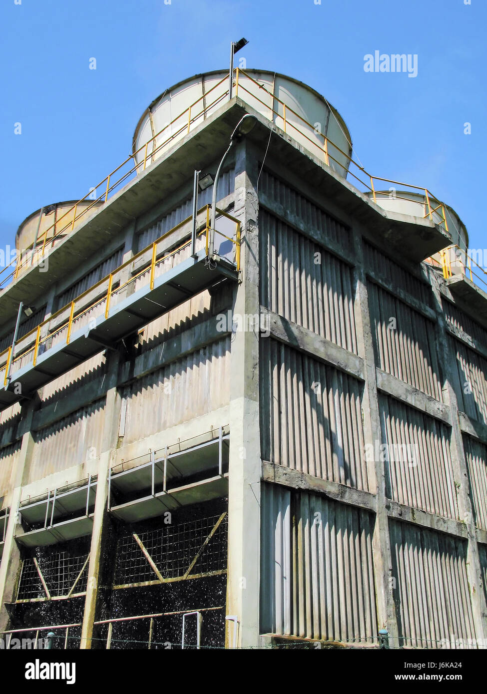 industrial concrete work factory building construction station blue tower Stock Photo - Alamy