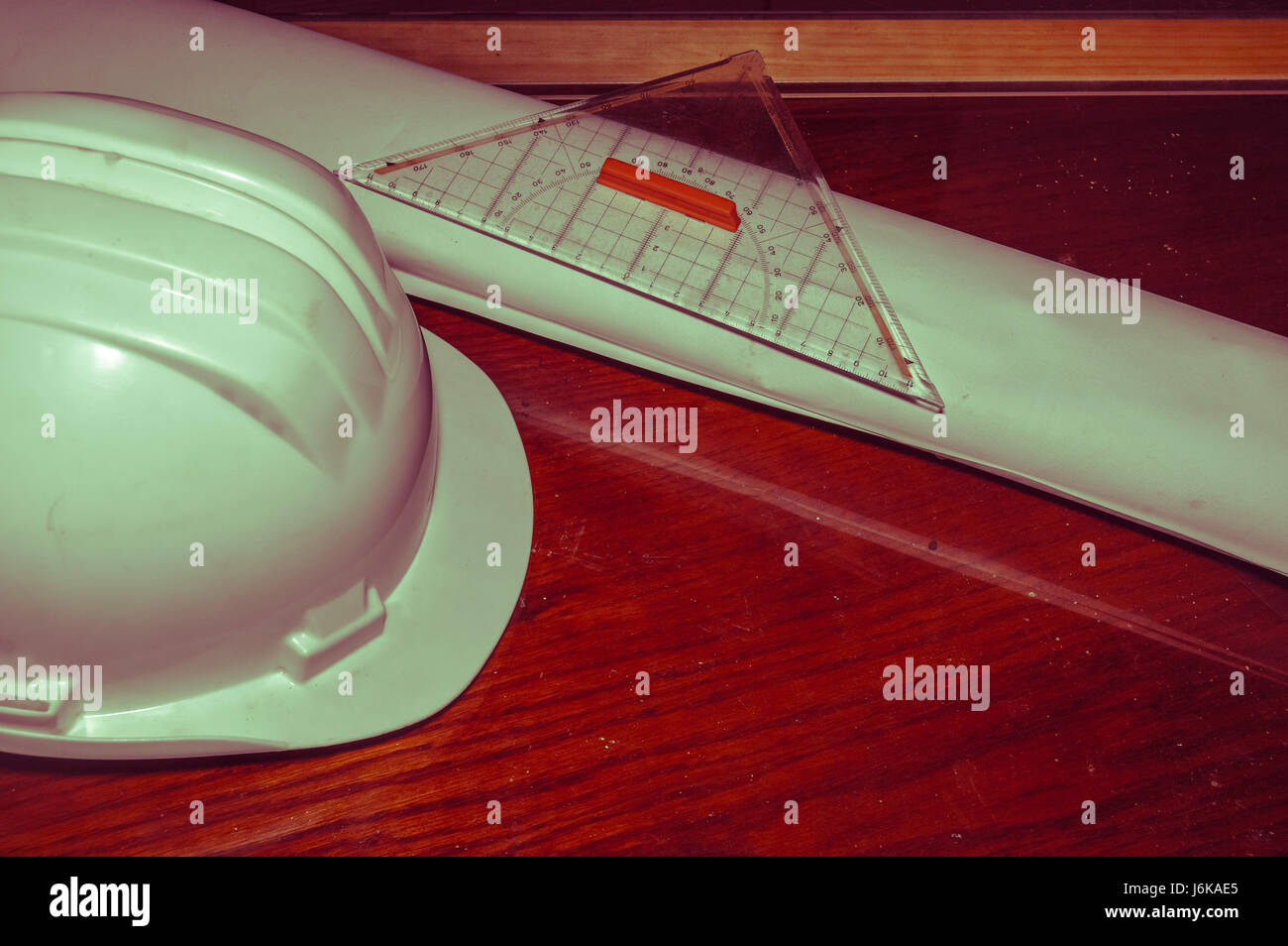 engineering concept background, white helmet with ruler, drawings and ...
