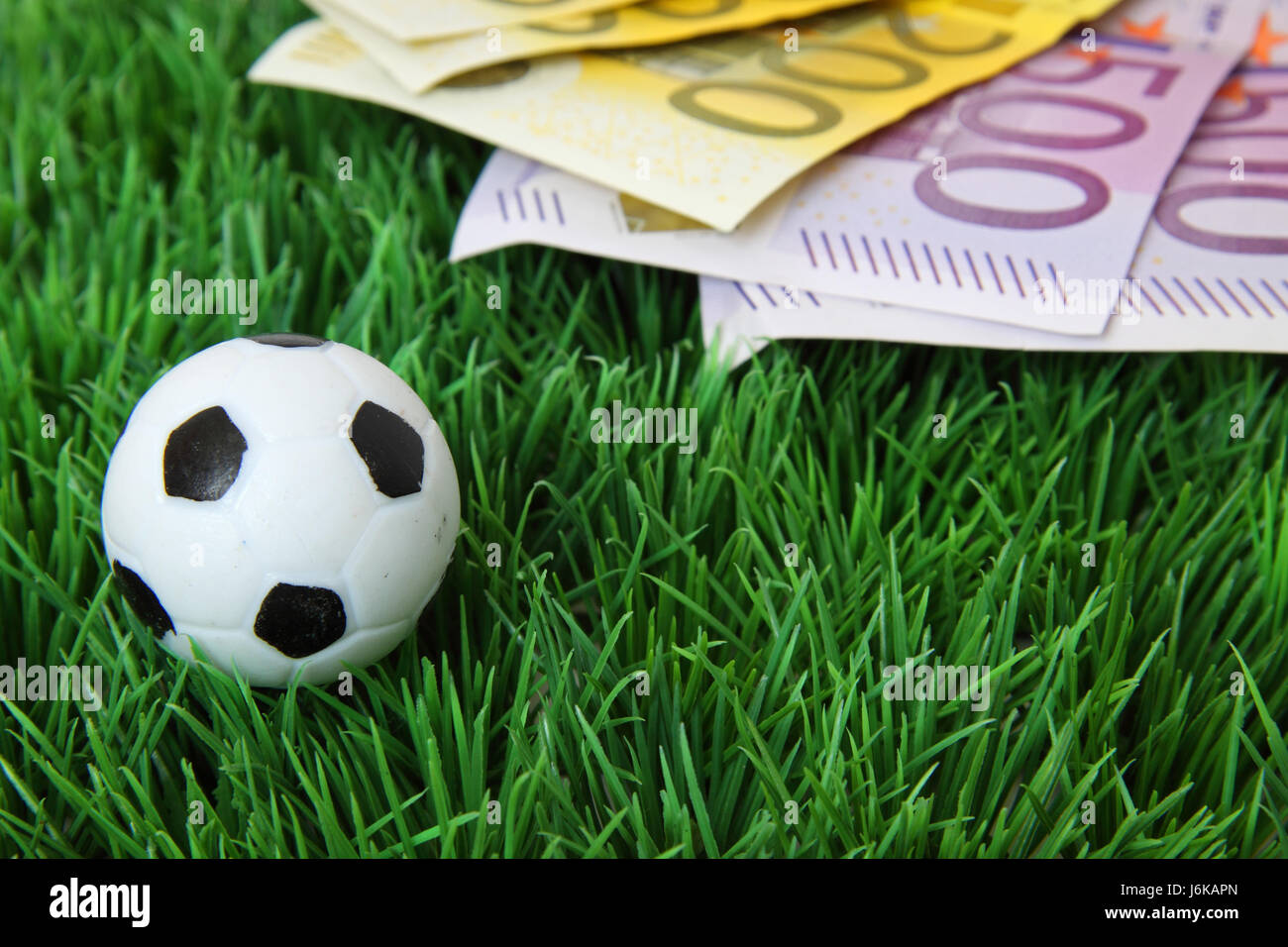 football and money Stock Photo - Alamy