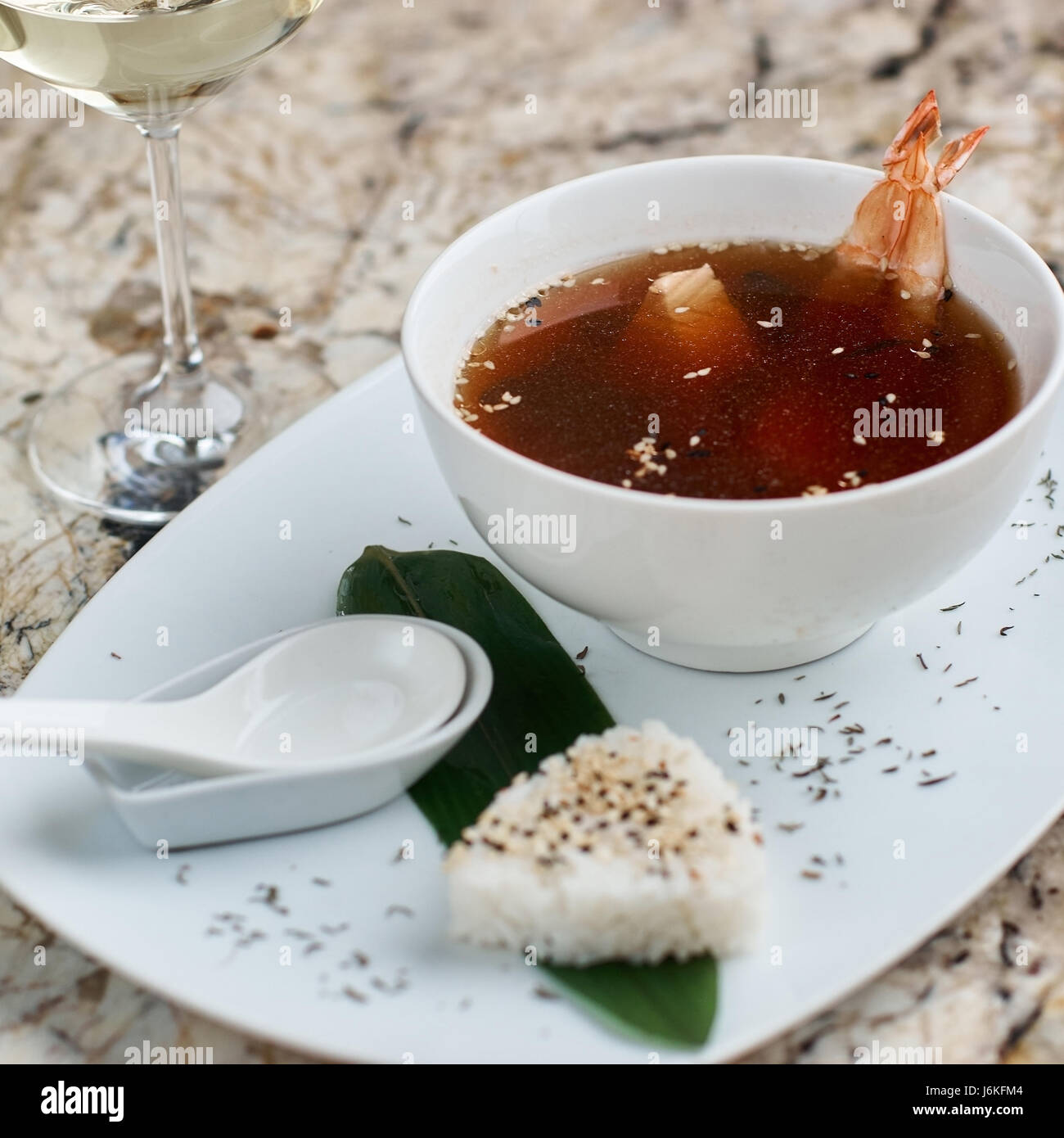 Suimono soup in white bowl Stock Photo - Alamy