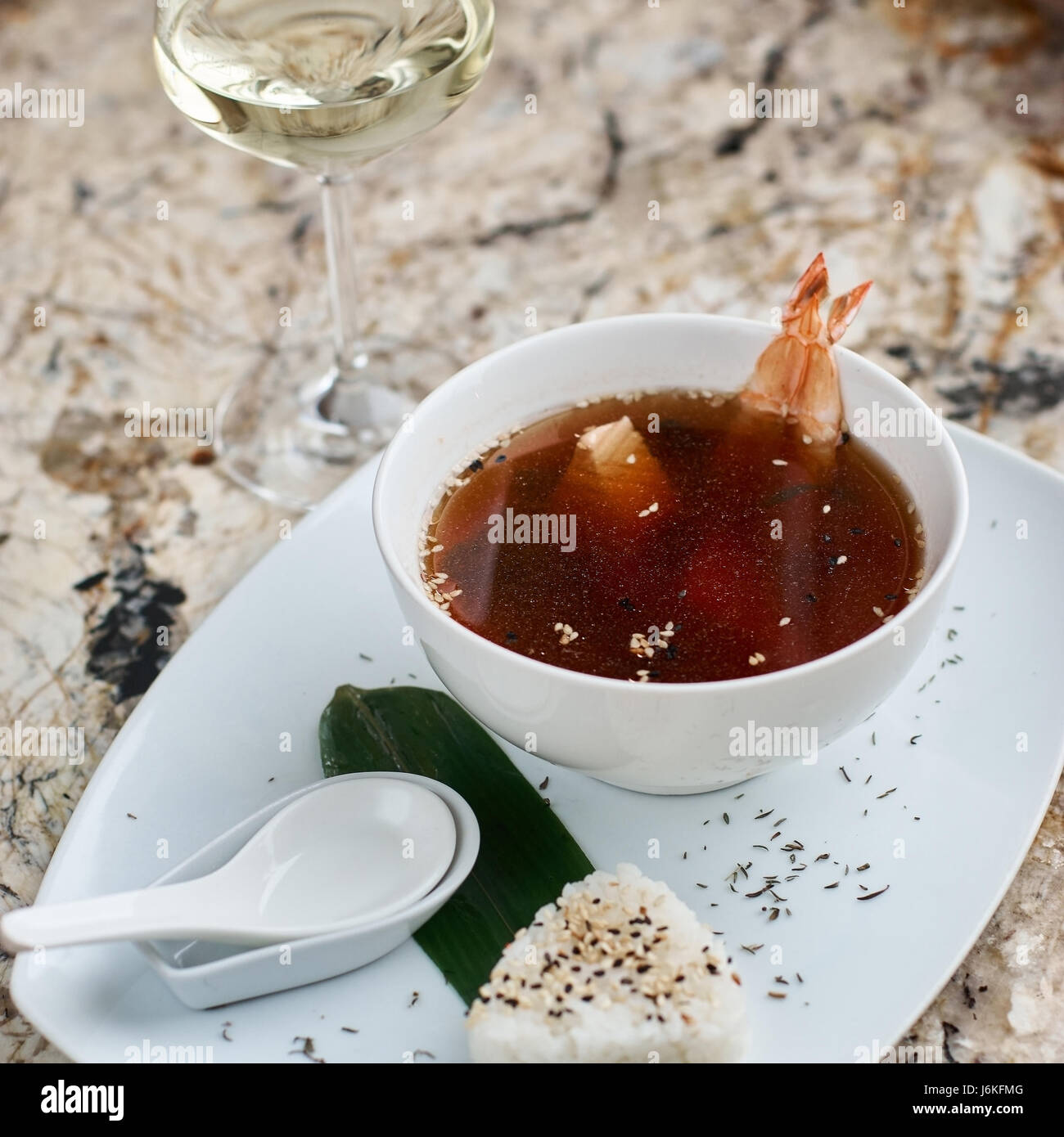 Suimono soup in white bowl Stock Photo - Alamy
