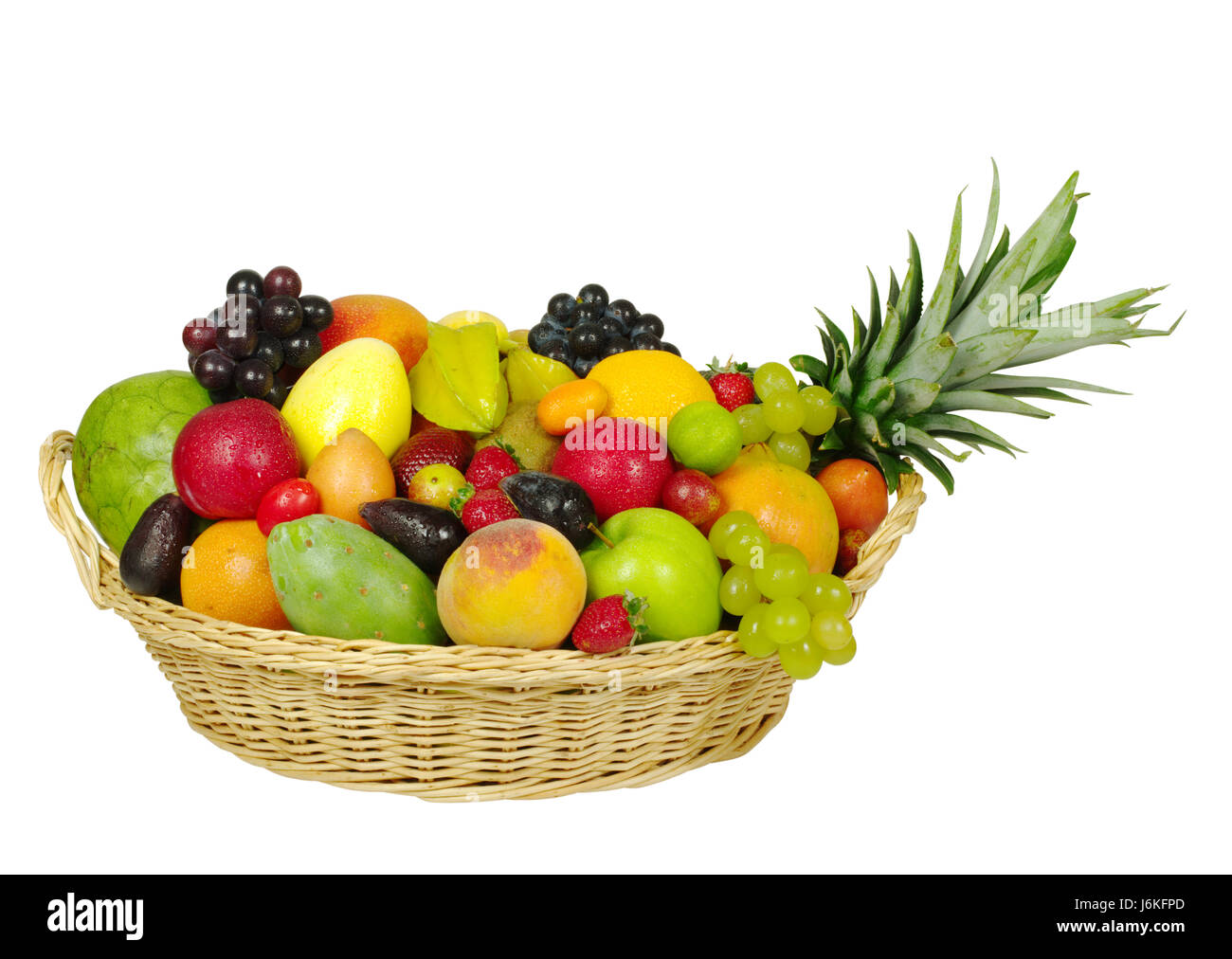 exotic fruit mix in basket Stock Photo - Alamy