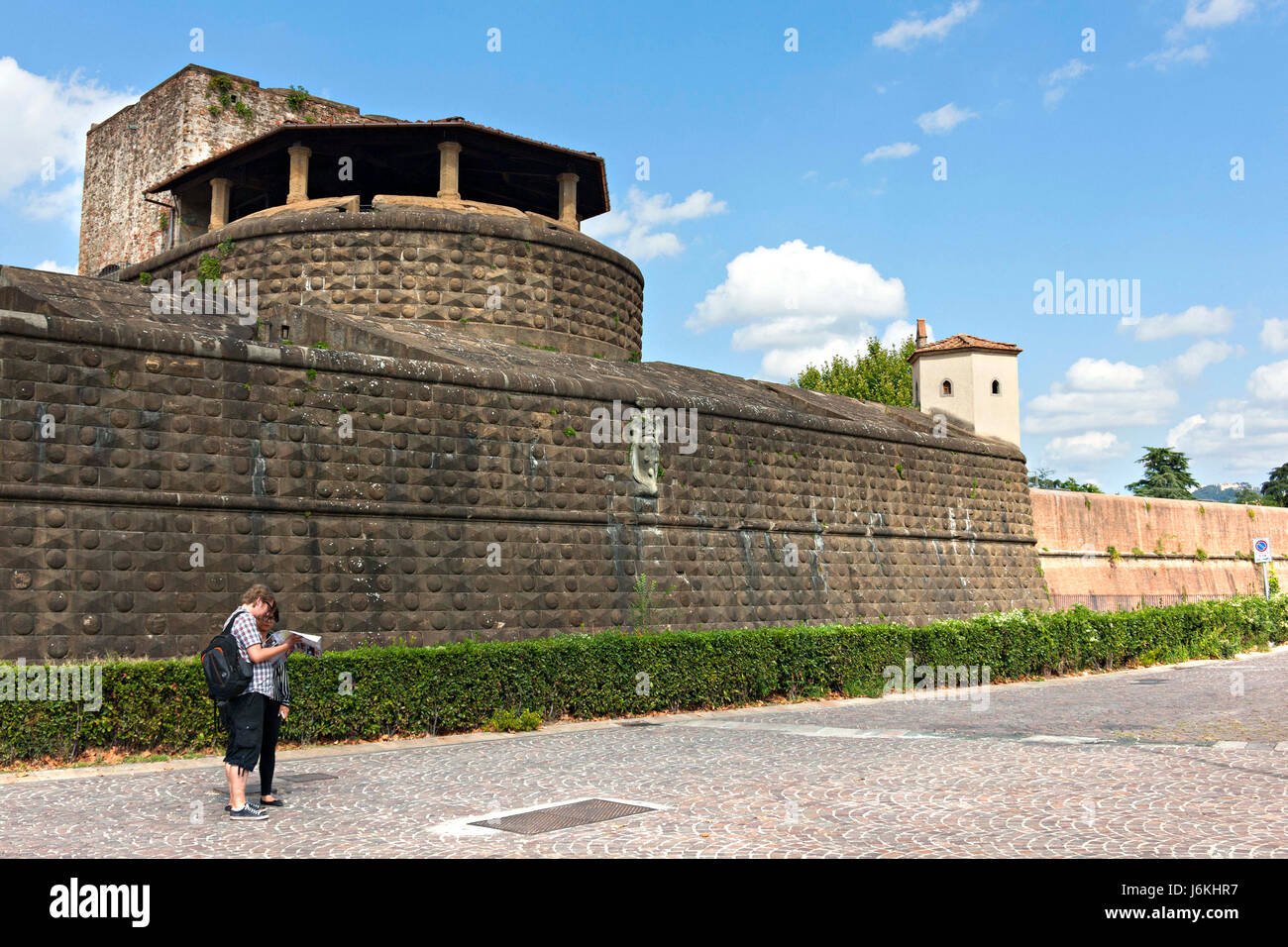 Tourists looking at map outside the Fortezza da Basso (Fortezza di San ...