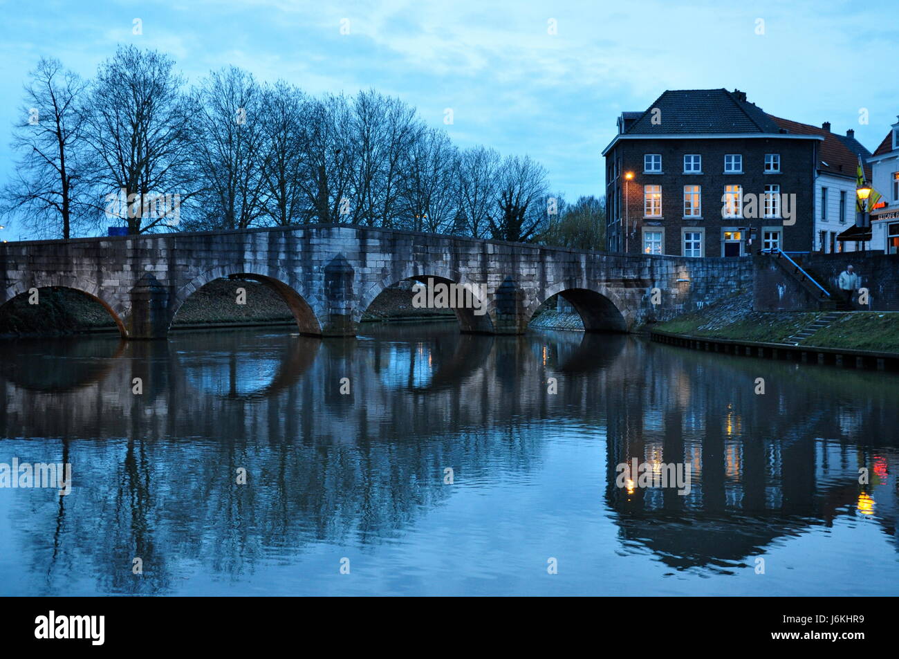 house at the old river bridge Stock Photo - Alamy