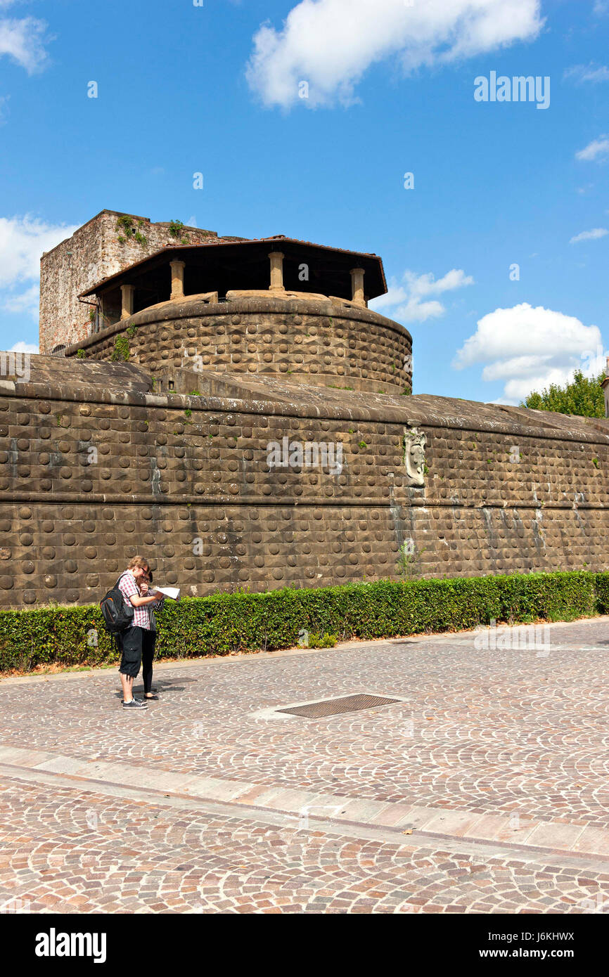 Tourists looking at map outside the Fortezza da Basso (Fortezza di San ...