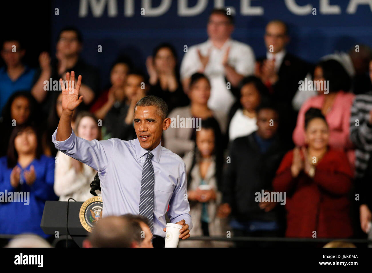 President Barack Obama waves after answering questions during a town ...