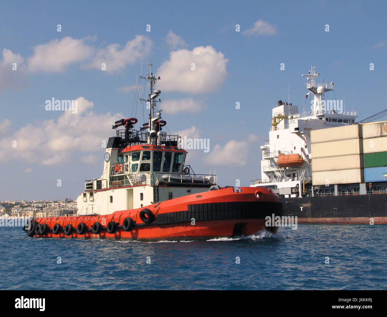 tug dock work Stock Photo - Alamy
