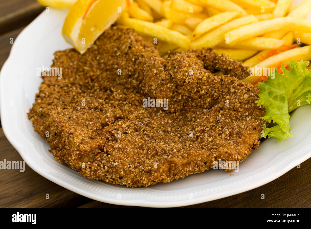 schnitzel crust breaded pork meat restaurant steak malt schnitzel food ...