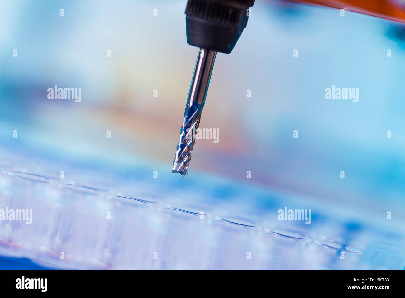 Cutter CNC router and plastic parts of Plexiglas Stock Photo - Alamy
