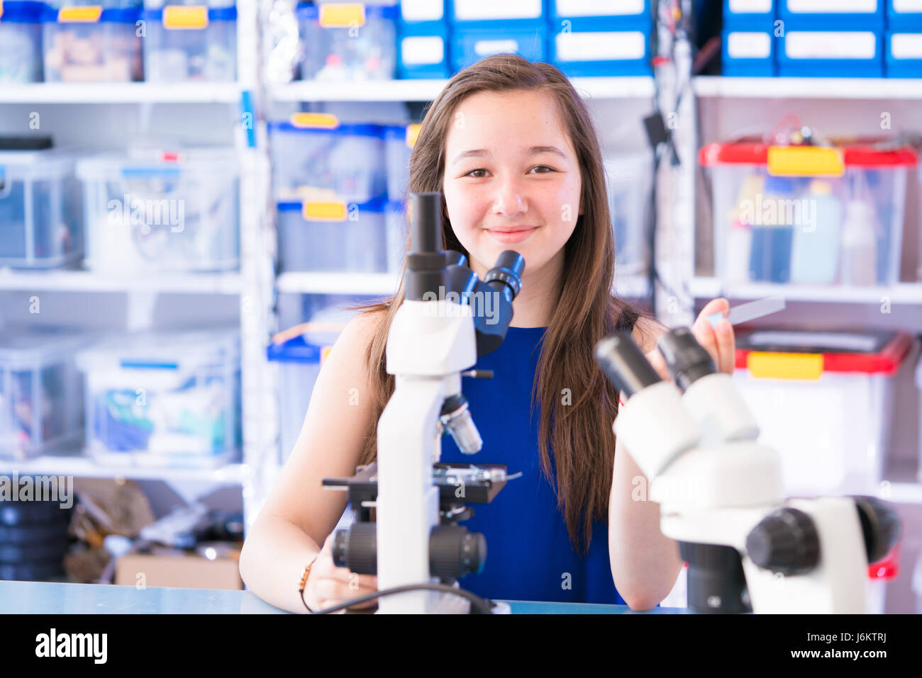 School girl in science class Stock Photo - Alamy