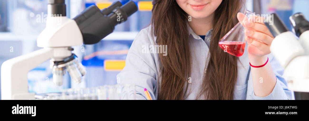School girl in science class Stock Photo - Alamy