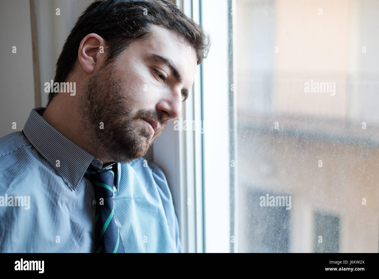 Portrait of a restless man face close up Stock Photo - Alamy