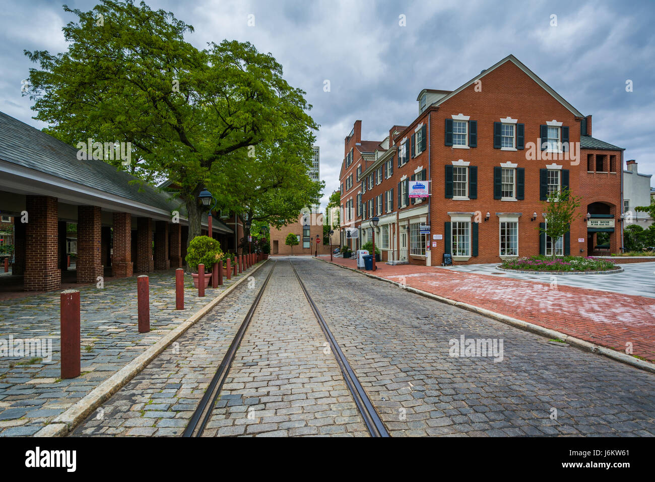Brick buildings and cobblestone street at Head House Square, in Society ...