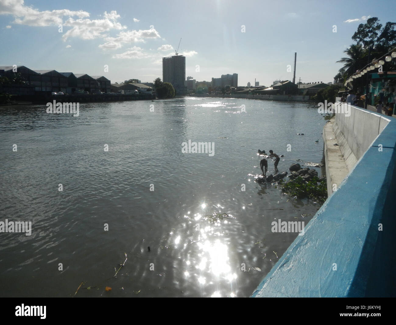 This image shows the Punta Santa Ana Linear Park along the Pasig River ...