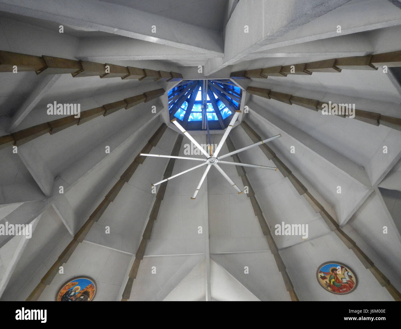 This photograph features the Jaime Cardinal Sin Village Church in ...
