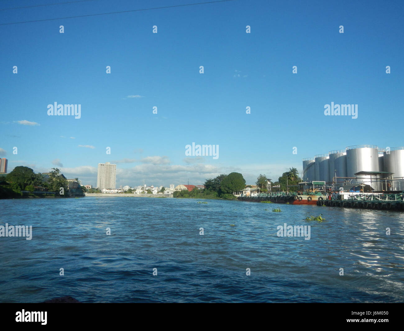 This 1929 photograph shows the Pasig River flowing through the ...