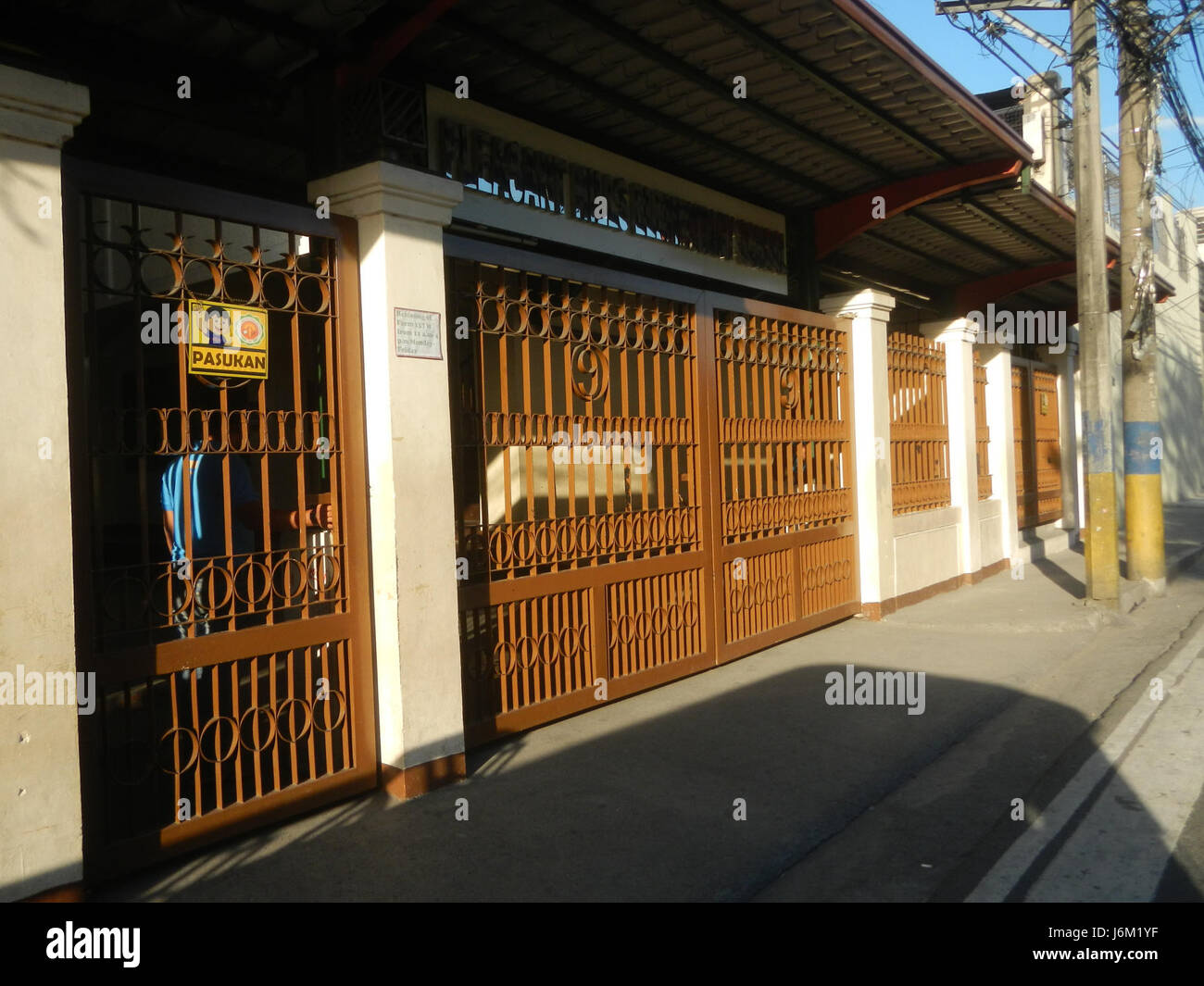 This image captures the vibrant urban landscape of Barangay Mauway and ...