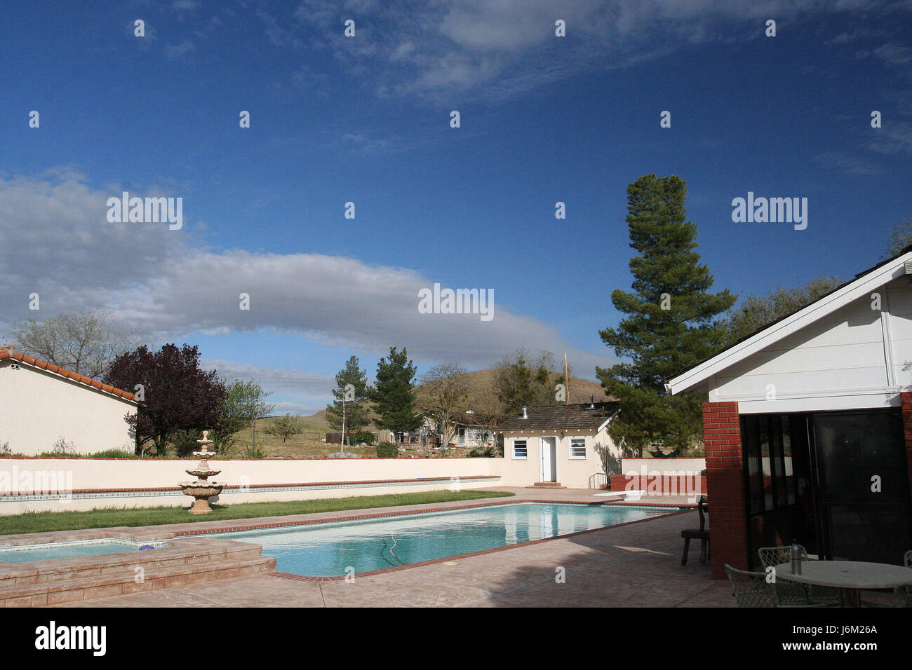 The Ranch House image titled *09-010* shows a typical rural residence ...