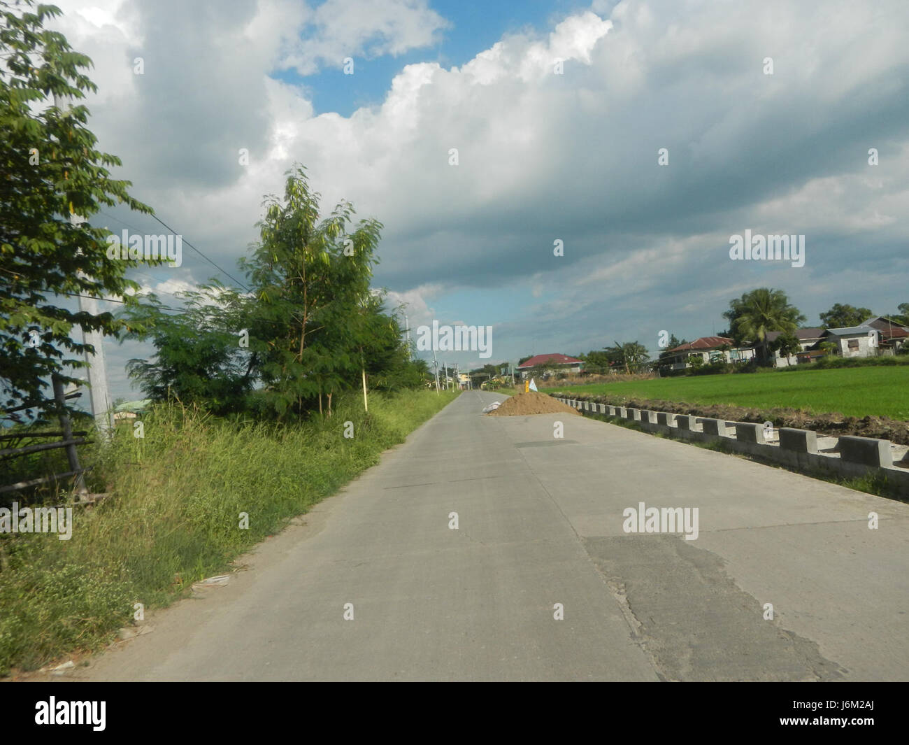 Aerial view of paddy fields, irrigation systems, and roads in ...