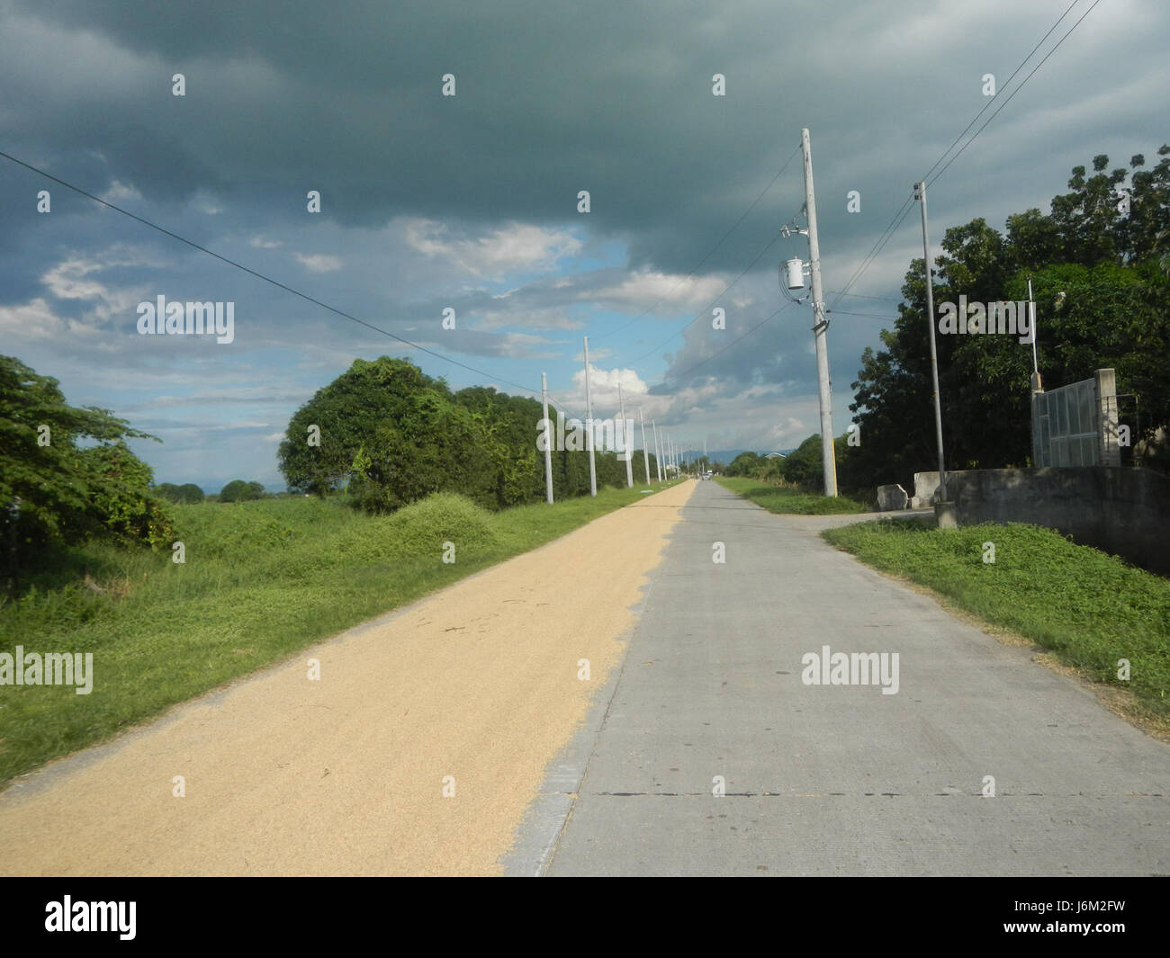 This photograph depicts the agricultural landscape of Magumbali ...
