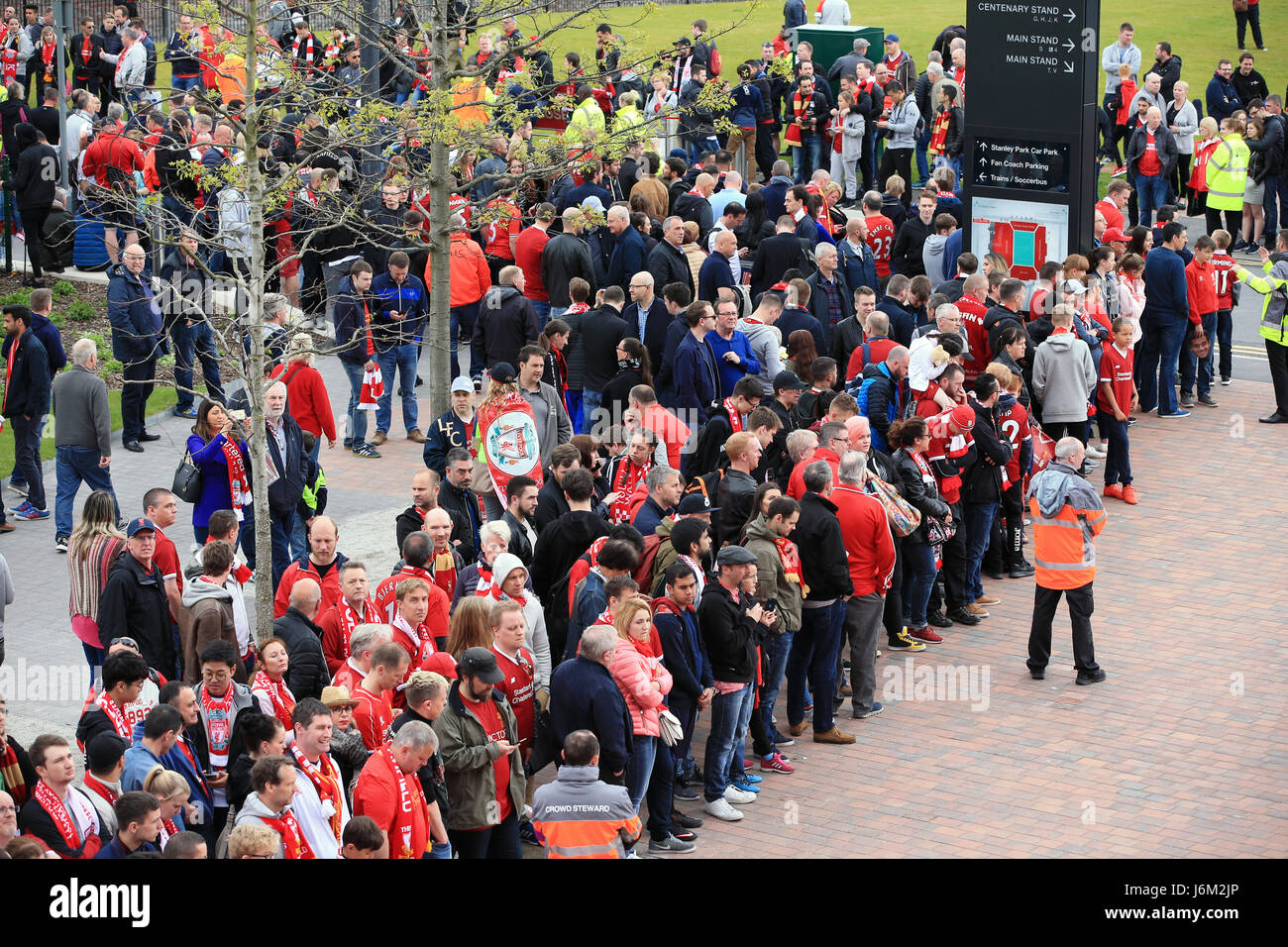 Liverpool fans arrive for the Premier League match at Anfield ...