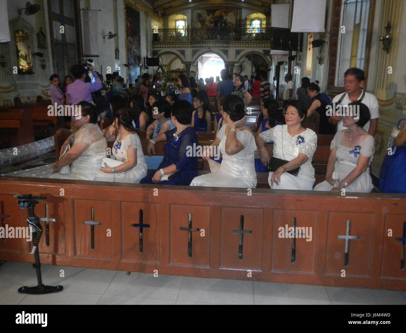 This image depicts a wedding ceremony at the Saint Ildephonsus of ...