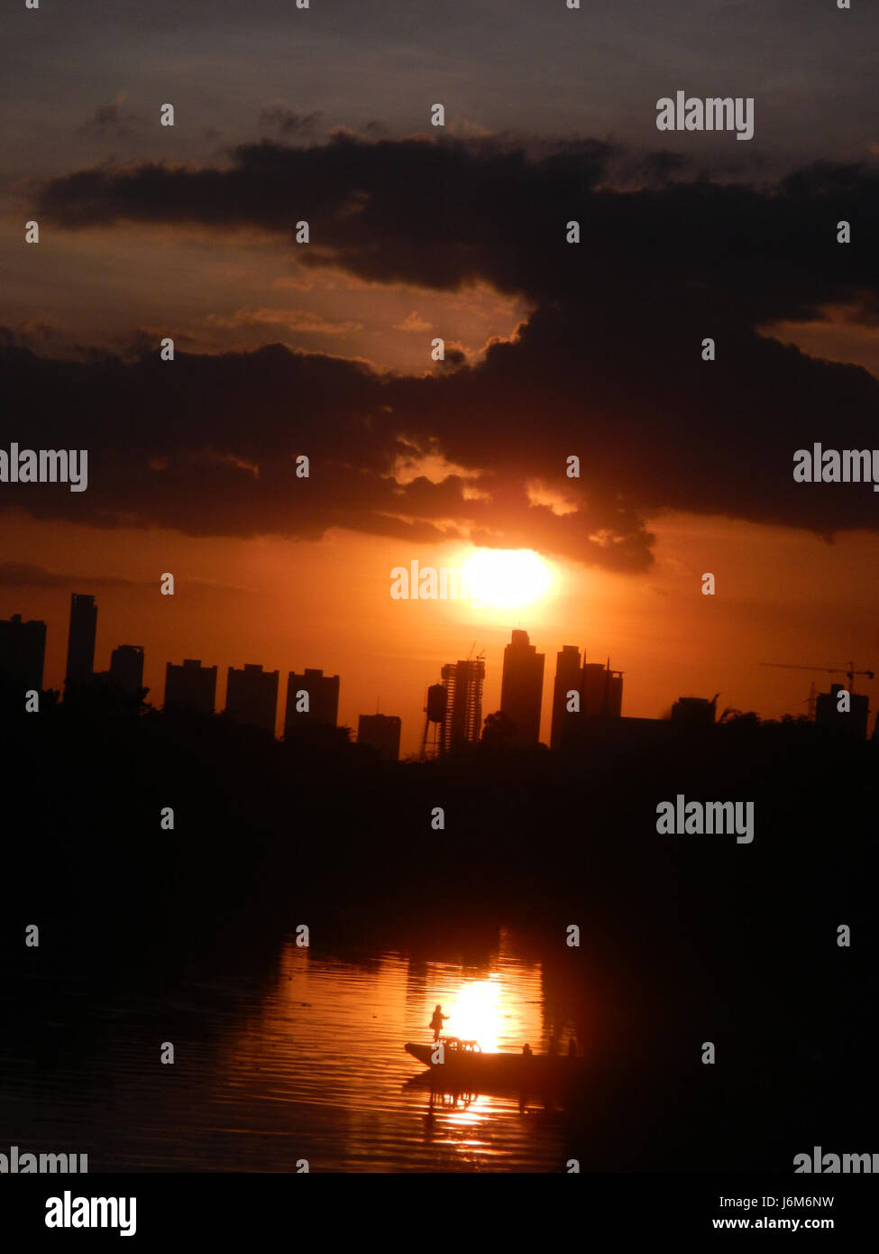 This photo captures the sunset over Kalentong and Bacood in Santa Ana ...