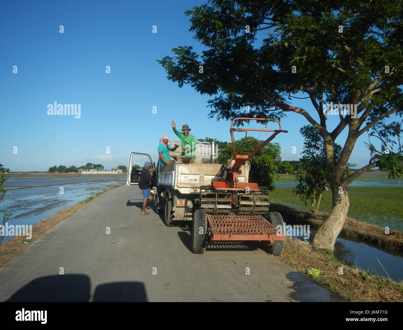The image captures the rural landscape of Balucuc, Apalit, Pampanga ...