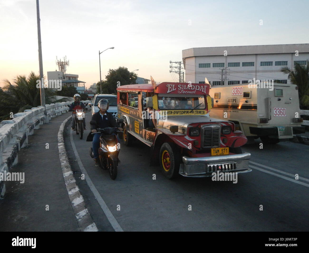 This photograph captures a sunset scene over Kalentong, Santa Ana, and ...