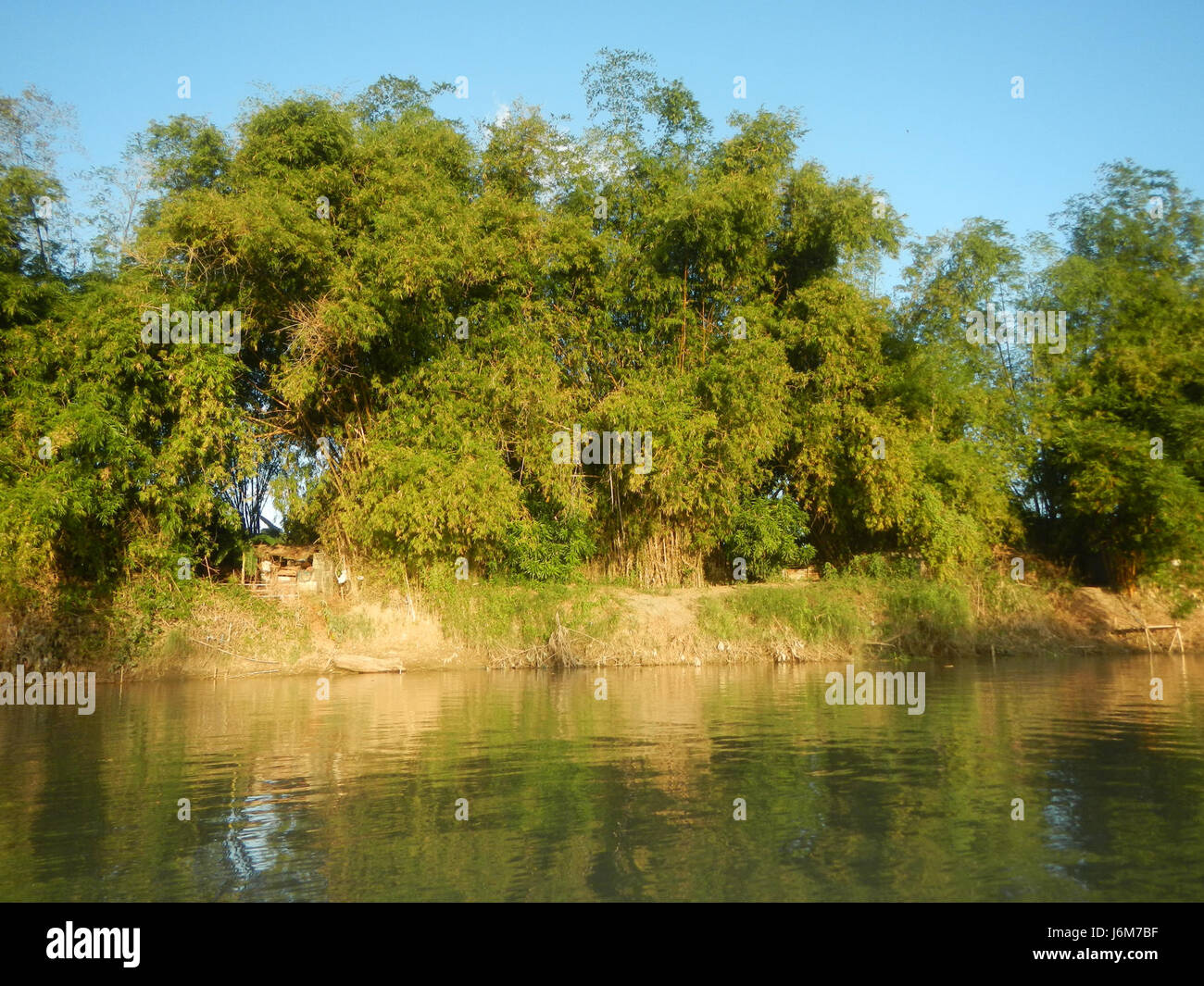 This image depicts the riverbanks of Cansinala in Apalit, Pampanga ...