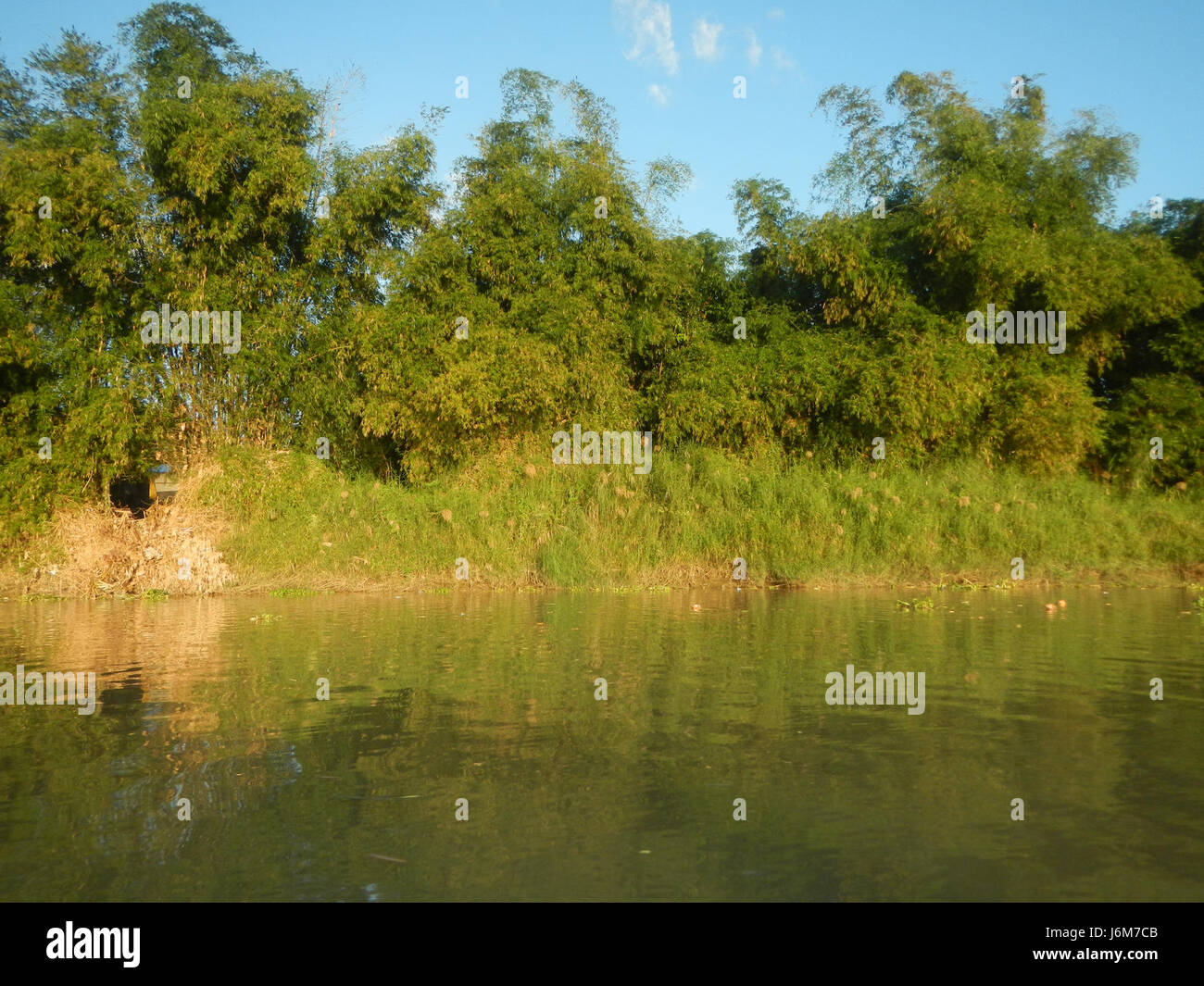 This image showcases the riverbanks of Cansinala in Apalit, Pampanga ...