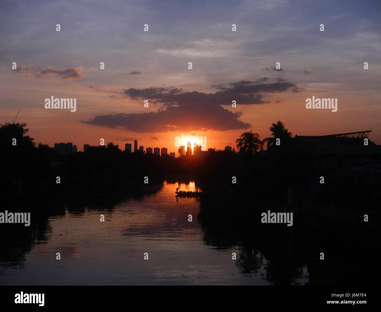 This image shows a sunset scene captured from Kalentong in Santa Ana ...