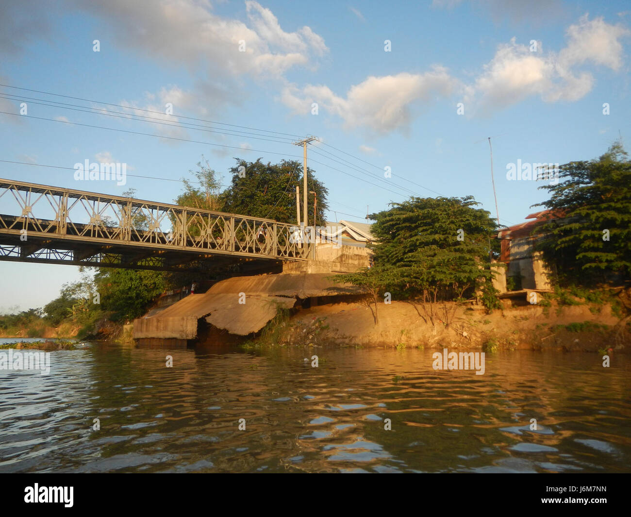 The riverbanks of the Pampanga River near the San Miguel Bridge in San ...