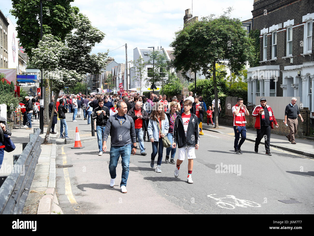 Arsenal fans arrive for the Premier League match at the Emirates ...