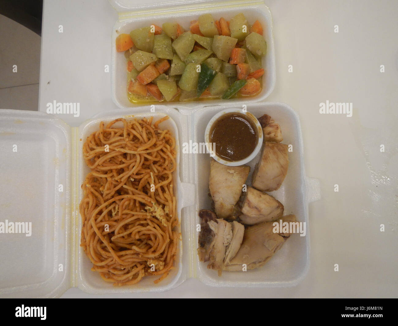 This image showcases traditional home-cooked cuisine from Bulacan ...
