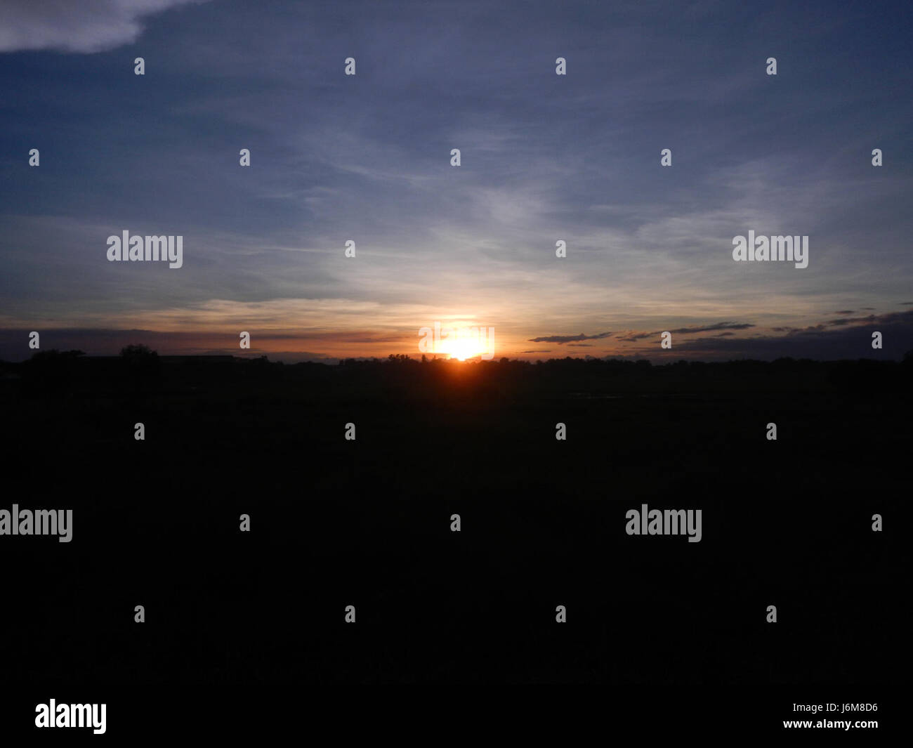 This image portrays a beautiful sunset view over San Ildefonso, Bulacan ...