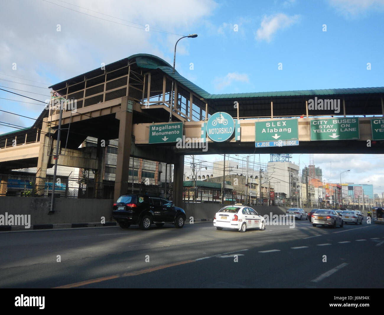 The image shows the C. Jose Footbridge on EDSA in Malibay, Pasay City ...