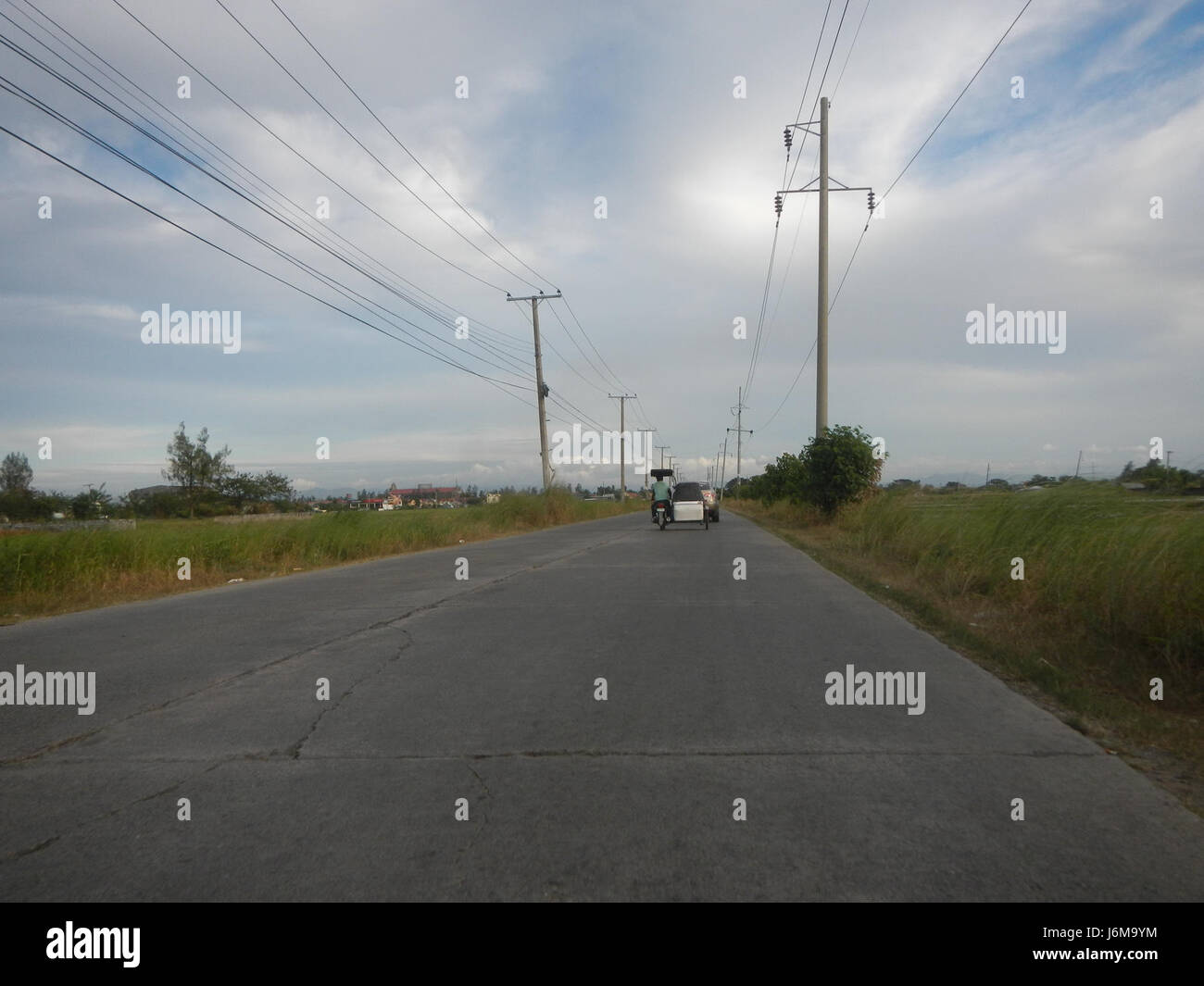 A scenic view of paddy fields and grasslands in Sumacab Sur Norte ...