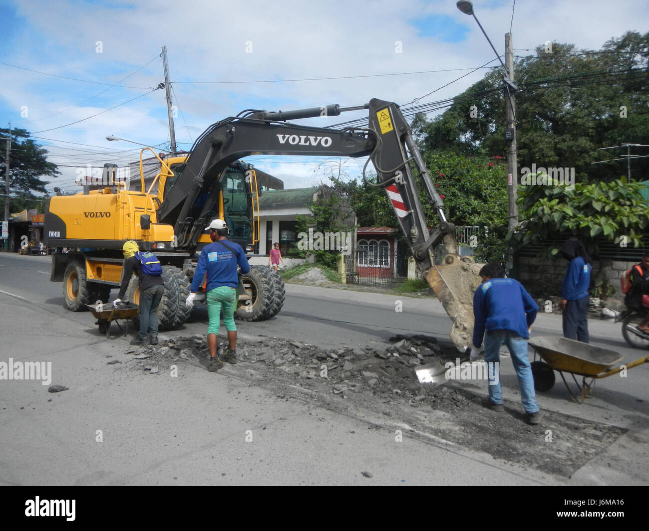 Road construction projects in Pulilan, Bulacan, Philippines, involve ...