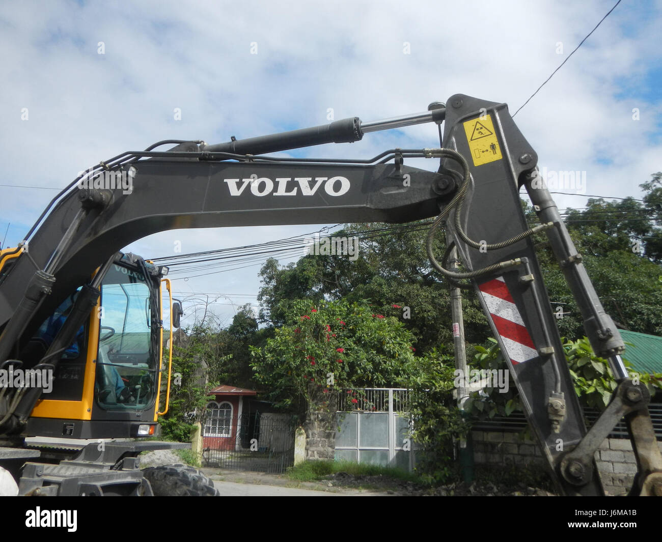 This image depicts road construction activities in Pulilan, Bulacan ...
